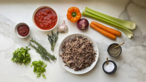 Hearty Lamb Ragu with Spinach and Ricotta - Cooking with Zahra